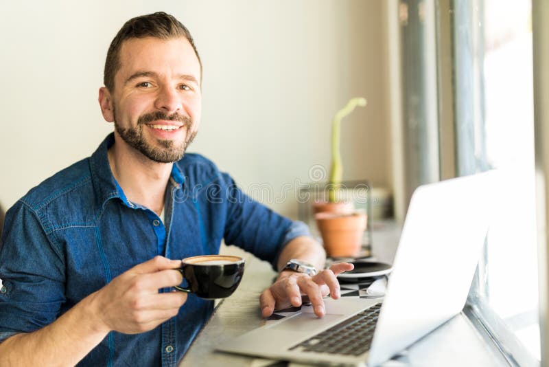 Drinking Coffee and Doing Some Work Stock Photo - Image of beard ...