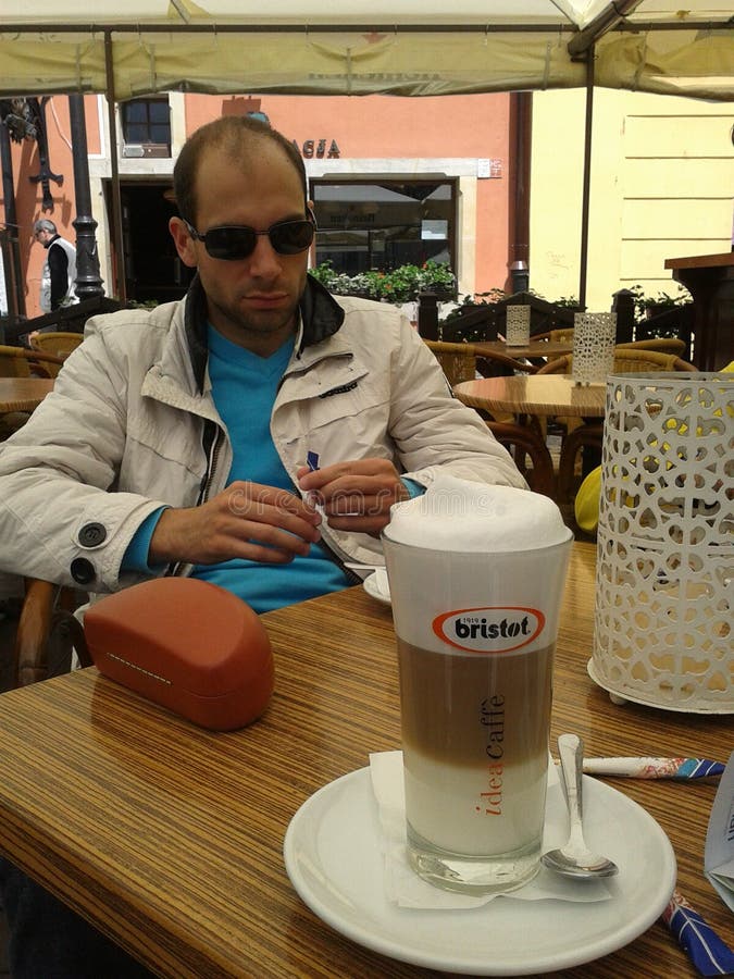 Drinking coffee editorial stock image. Image of coffee - 41142829