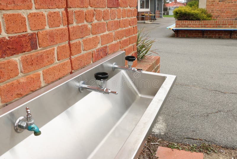 Drinking Fountain, Tap and Trough in a School Yard Stock Image - Image ...