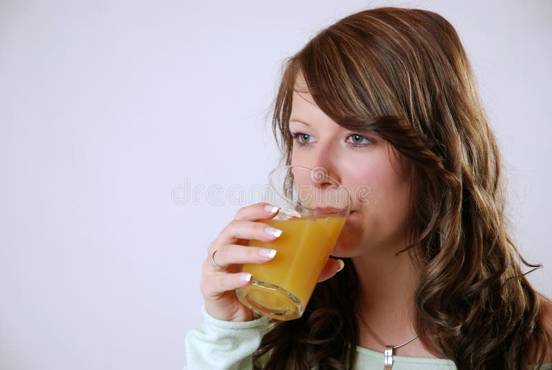 Drinking juice stock image. Image of fresh, orange, happiness - 14287975