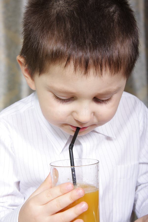 Drinking juice stock photo. Image of froth, juice, stirring - 4195414