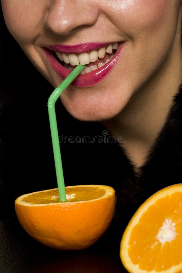 Drinking-an-orange-02 stock image. Image of cuisine, health - 501255
