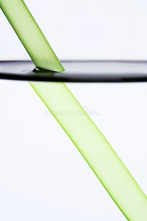 Drinking-straw Refracted by Water Stock Photo - Image of angle, orance ...
