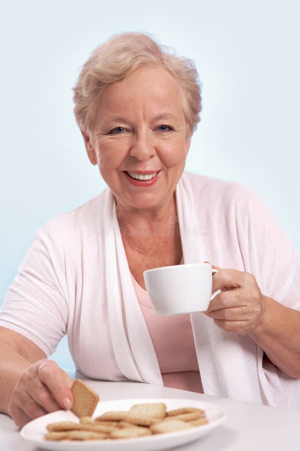 Drinking tea stock image. Image of lifestyle, drink, cookies - 16127471