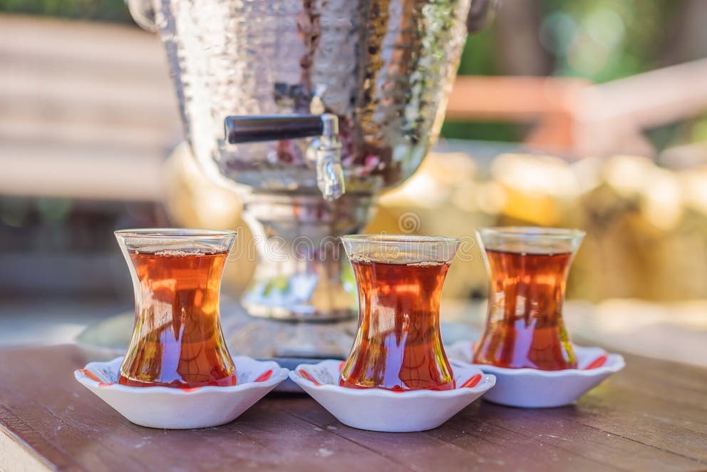 Drinking Traditional Turkish Tea with Turkish Tea Cup and Copper Tea ...