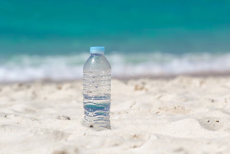 Water in bottle on beach stock photo. Image of caribbean - 29842872