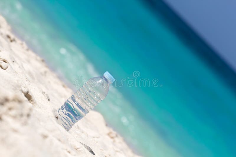 Water in bottle on beach stock photo. Image of caribbean - 29877542