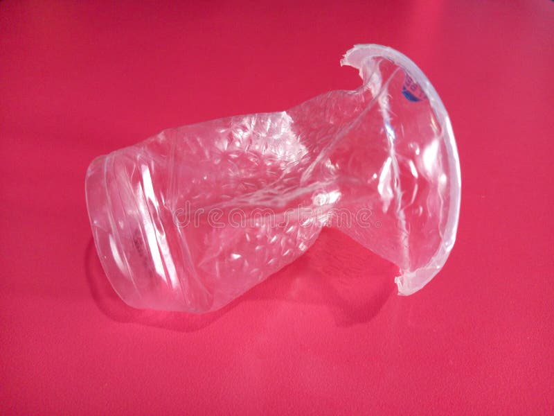 Drinking Water in an Empty Plastic Cup. Single Use Cup Stock Image ...