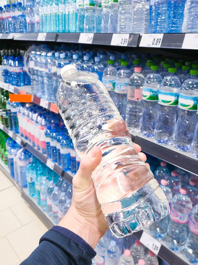 Drinking Water in Hand at Shop Stock Image - Image of department, pack ...