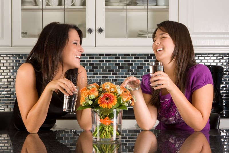 Drinking Water in the Kitchen Stock Photo - Image of brunette, people ...