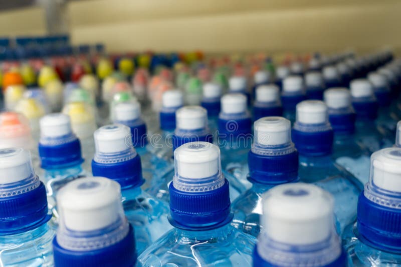 Drinking Water, Multi-colored Plastic Cap. Bottle Caps on the Market ...