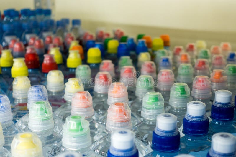 Drinking Water, Multi-colored Plastic Cap. Bottle Caps on the Market ...