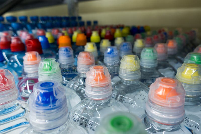 Drinking Water, Multi-colored Plastic Cap. Bottle Caps on the Market ...