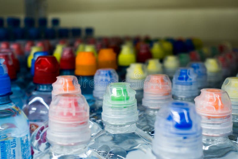 Drinking Water, Multi-colored Plastic Cap. Bottle Caps on the Market ...