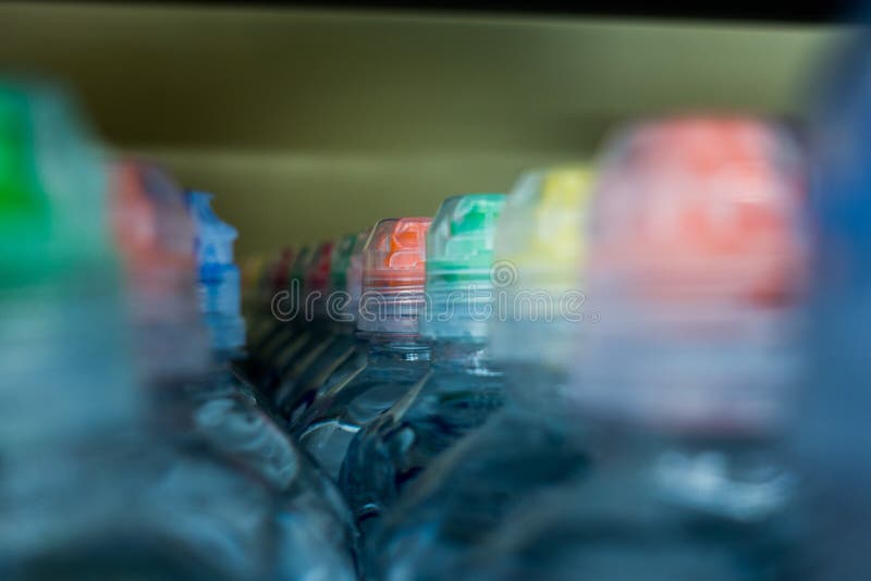Drinking Water, Multi-colored Plastic Cap. Bottle Caps on the Market ...