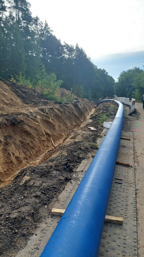 Drinking Water Pipeline Under Construction in Deep Ditch Stock Image ...