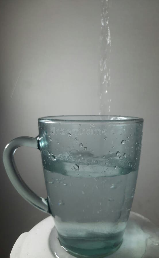 Drinking Water Poured into a Glass Stock Photo - Image of glass, water ...