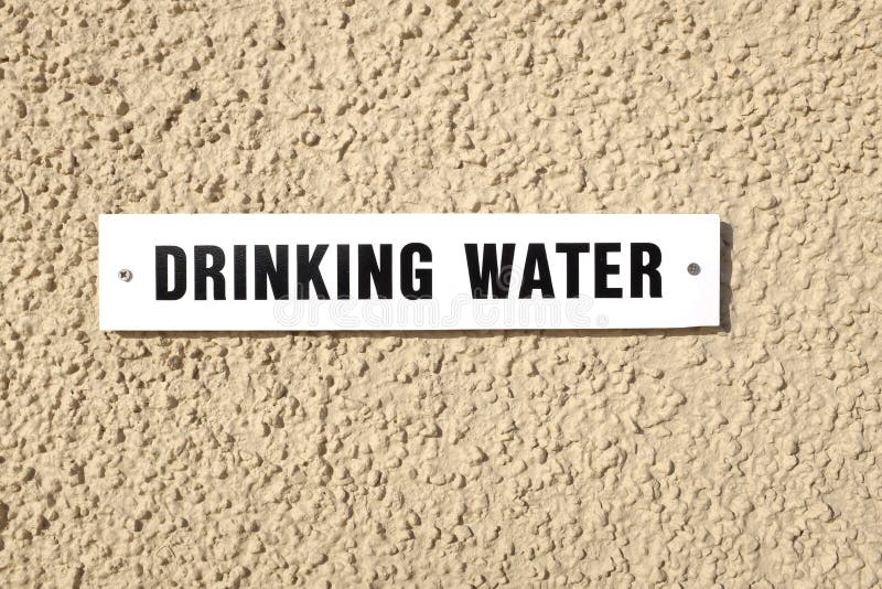 Sign for Drinking Water on a Outside Faucet Stock Photo - Image of ...