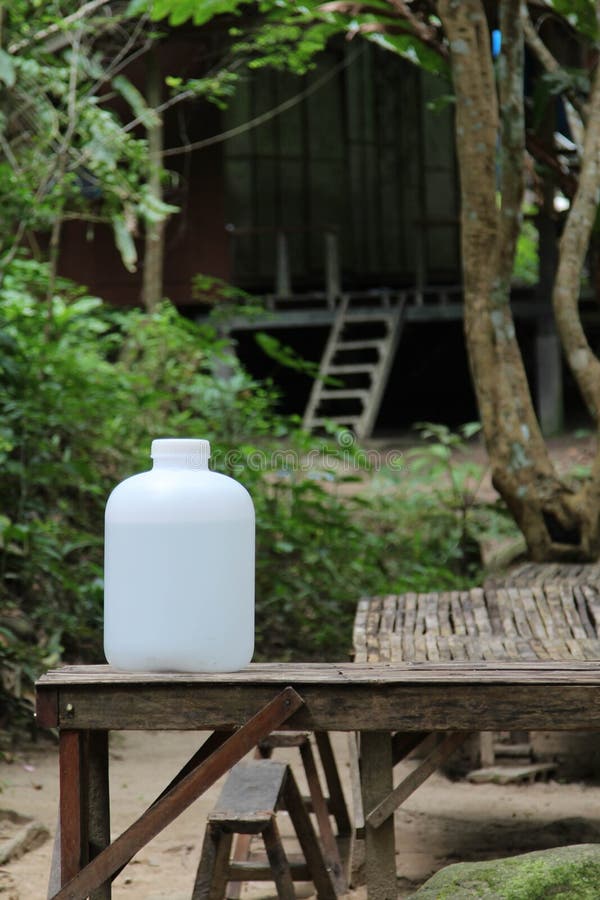 Drinking water tank stock photo. Image of wooden, table - 109484470