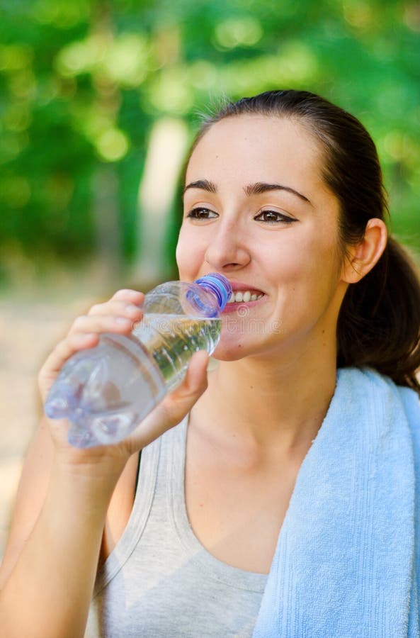 Drinking Water after Workout Stock Photo - Image of young, natural ...