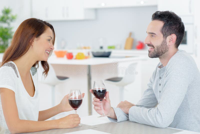 Drinking wine in house stock photo. Image of happy, conversation - 83782044