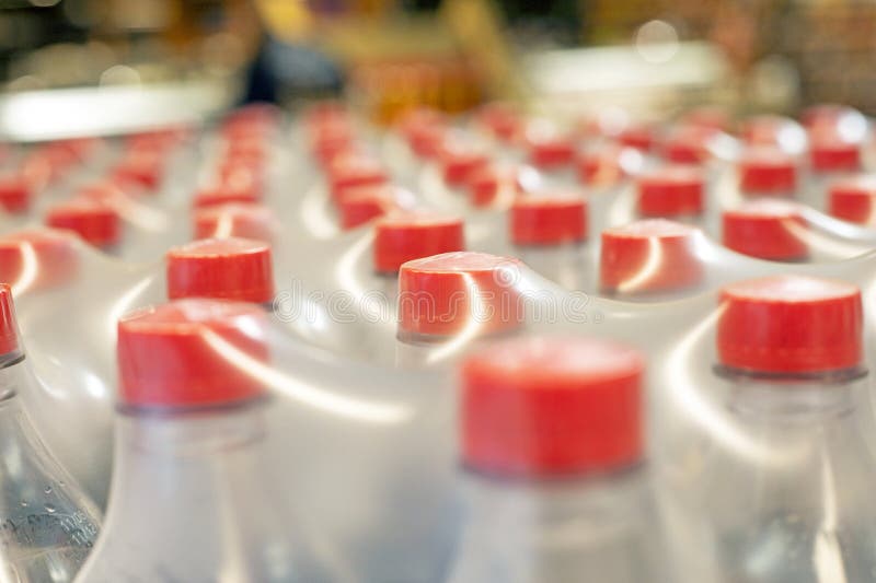 Drinks Packaged in Plastic Containers and Wrapped in Thick Film Stock ...