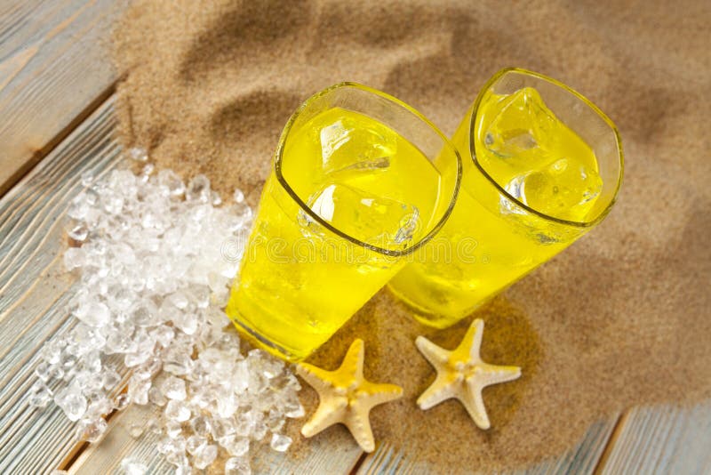 Drinks, Shells and Ice Cubes on the Beach Stock Photo - Image of ...