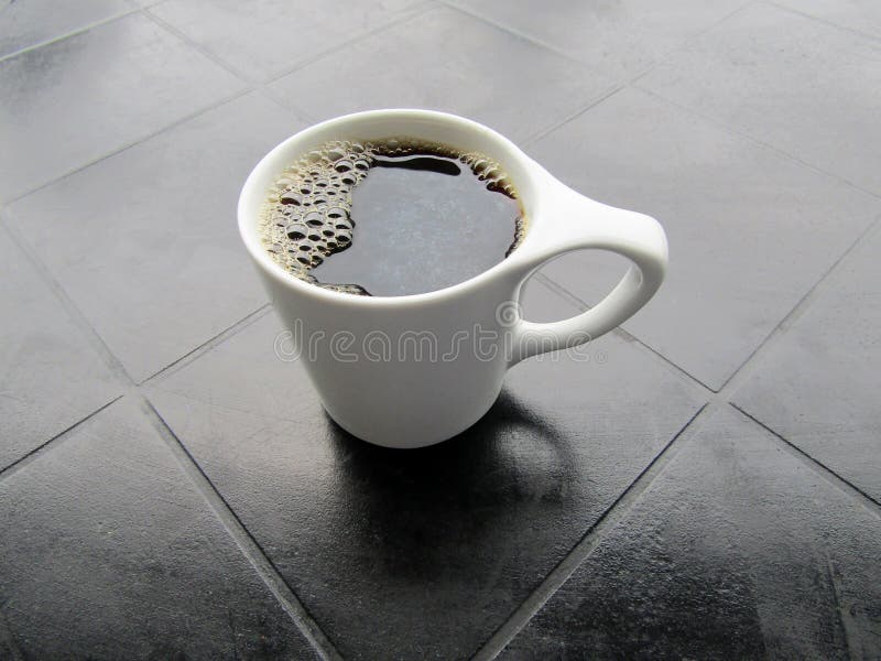 Drip Brewed Coffee in White Ceramic Glass Mug on Black Patio Table ...