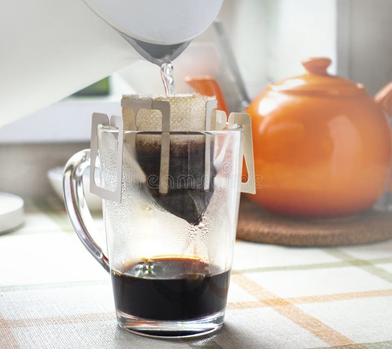 Drip Coffee Bag in a Cup, Pour-over Technique Stock Photo - Image of ...