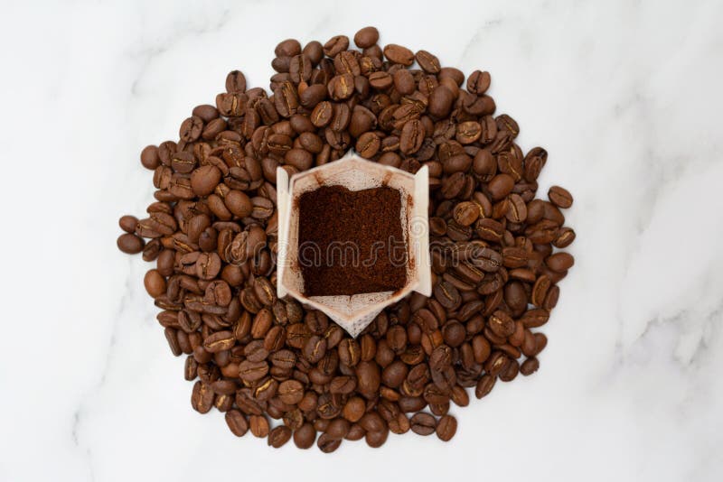 Drip Pack Stands on Roasted Coffee Beans. the Concept of Delicious and ...