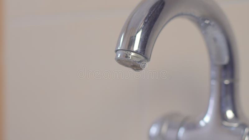Dripping Bathroom Faucet Spout. View from Front Straight on at Low ...