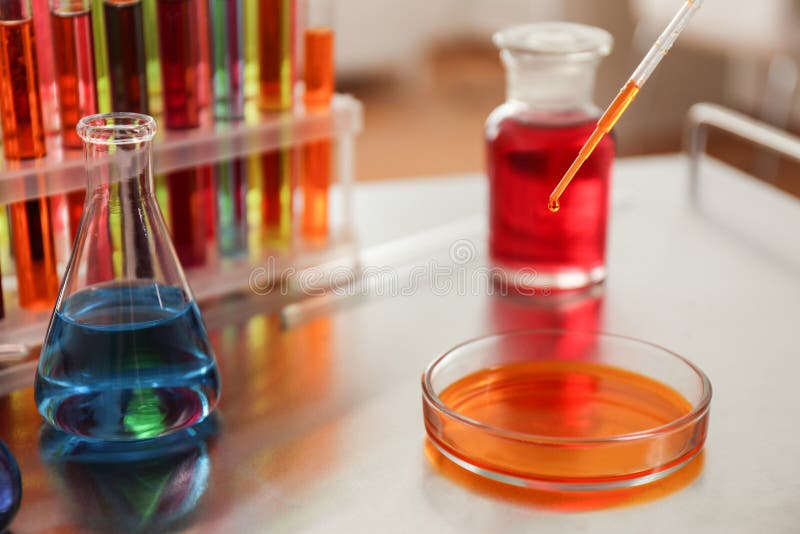 Dripping Color Liquid into Petri Dish. Solution Chemistry Stock Image ...