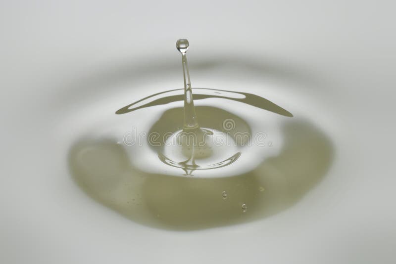 Dripping Colorless Oil on White Background. Stock Image - Image of drop ...