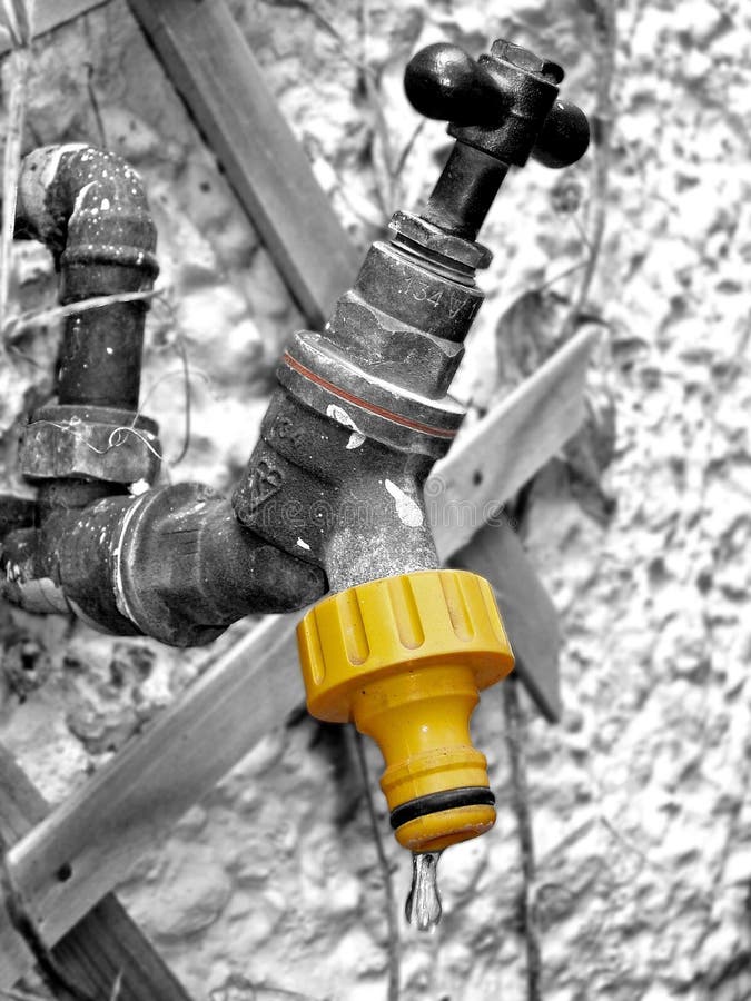 A dripping garden tap stock image. Image of attachment - 207348307