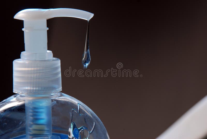 Hand Pumping Alcohol Gel or Sanitizer Gel To Others Hand for Washing ...