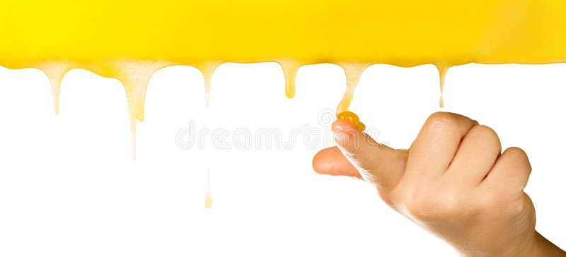 Dripping Honey on the Finger of a Child S Hand, Liquid Caramel Stock ...