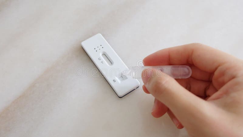 Dripping the Specimen Sample Onto the Self Testing Ki Stock Image ...