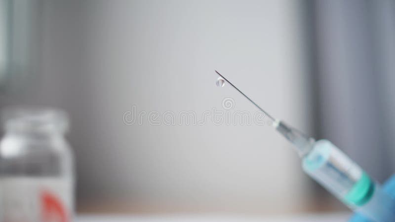 Dripping Syringe with Needle Close-up Shot Stock Image - Image of treat ...