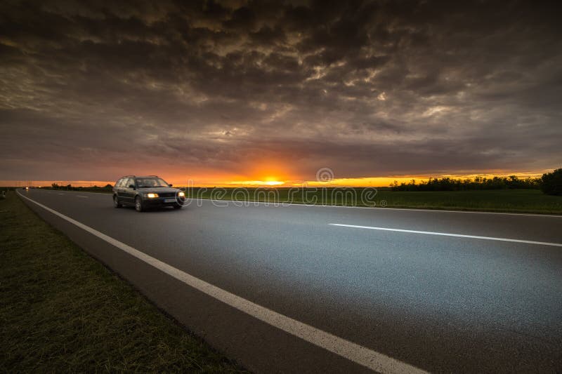 Drive at dusk stock image. Image of vehicle, perspective - 71439933