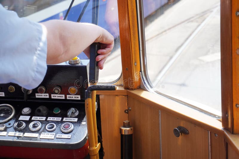 Drive of the Old Wooden Tram, the Driver at the Controls of the Tram ...