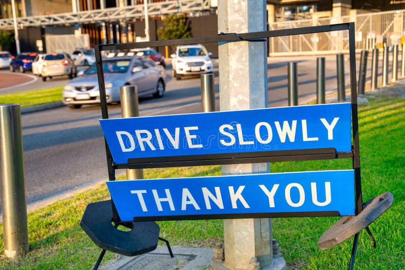 Drive Slowly Road Sign in Australia Stock Photo - Image of tourism ...
