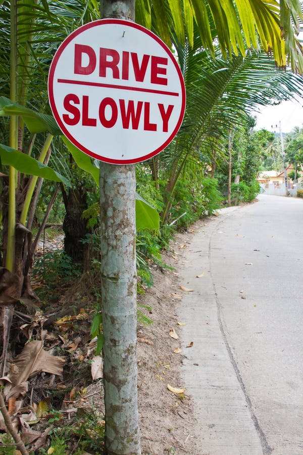 Drive Slowly Sign stock image. Image of auto, road, commute - 25481557