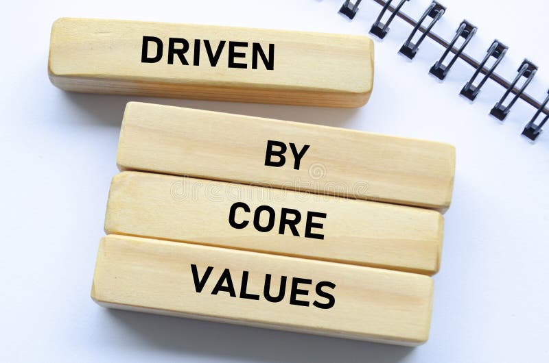 Driven by Core Values Text on Wooden Blocks and Notebook Represents ...