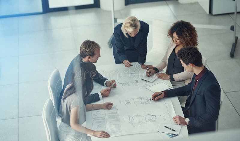 Corporate Architects Discussing Sustainable Design and Profitable ...