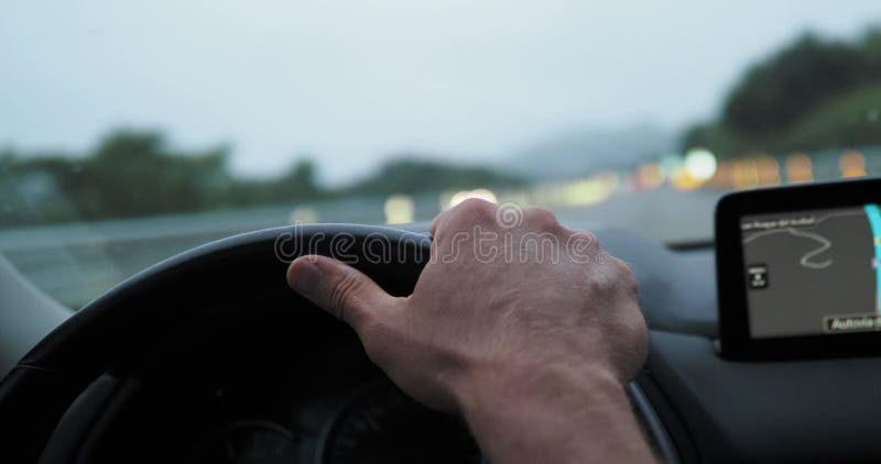 Driver Adjusting Hand Position while Driving on Highway Stock Footage ...