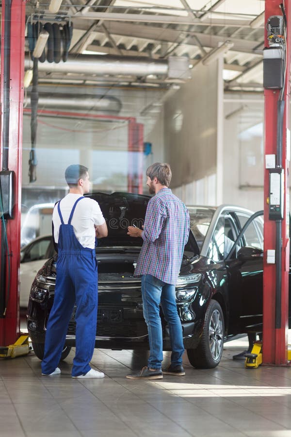 Car mechanic at work stock image. Image of repairman - 64129211