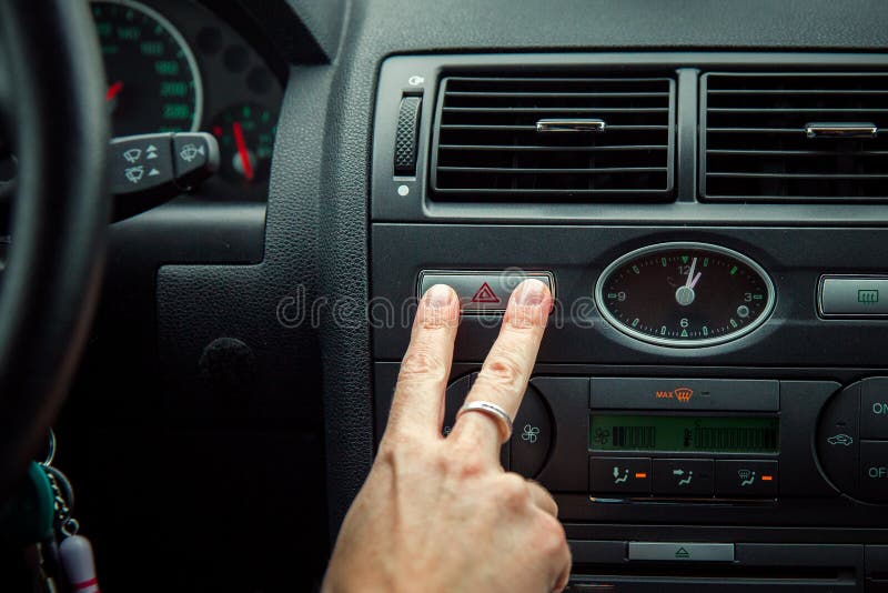 A Driver in a Car Performs Tasks Necessary To Steer the Vehicle Stock ...