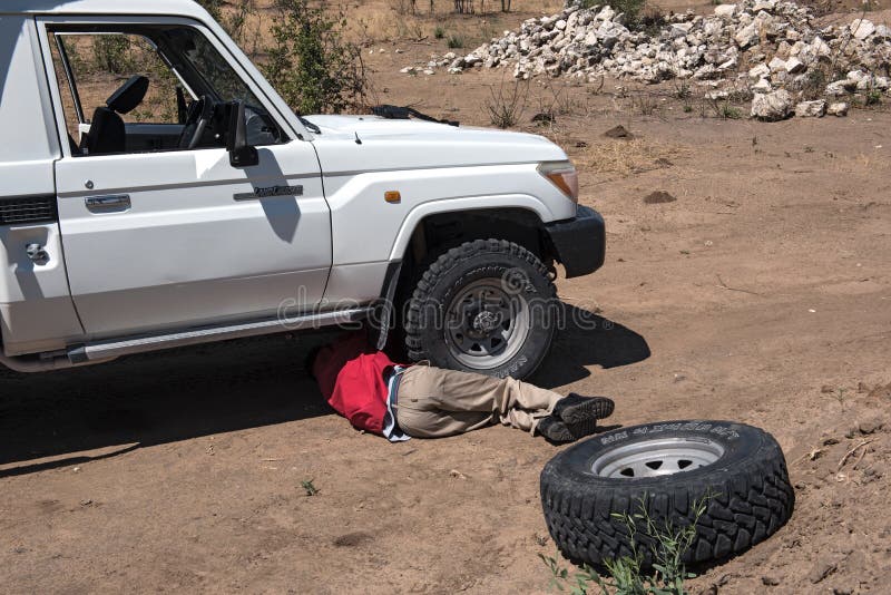 The Driver Changes the Front Broken Tire Editorial Image - Image of ...