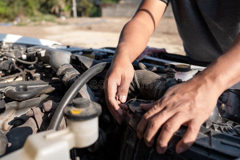The Driver is Checking the Car before Traveling, Safety First Concept ...