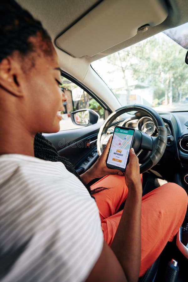 Driver Checking New Requests Stock Photo - Image of application, adult ...